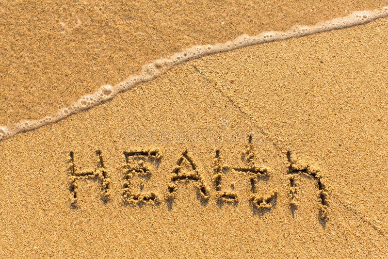 Health - Word Drawn on the Sand Beach with the Soft Wave. Abstract ...
