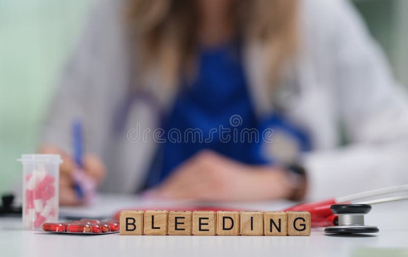 A Healthcare Professional is Actively Examining a Patients Bleeding ...