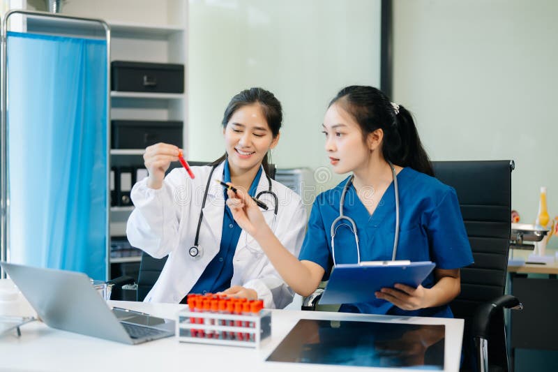 Healthcare Professionals Analyzing Test Results with Lab Tools ...