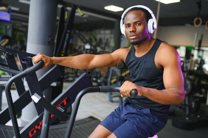 Healthy African American Man Exercising in Gym Stock Photo - Image of ...