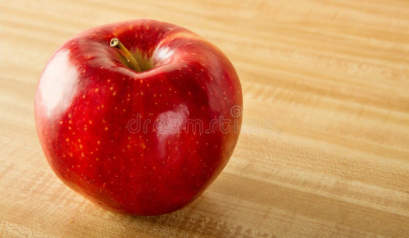Apple Being Cut in Half stock photo. Image of apple, kitchen - 18936022