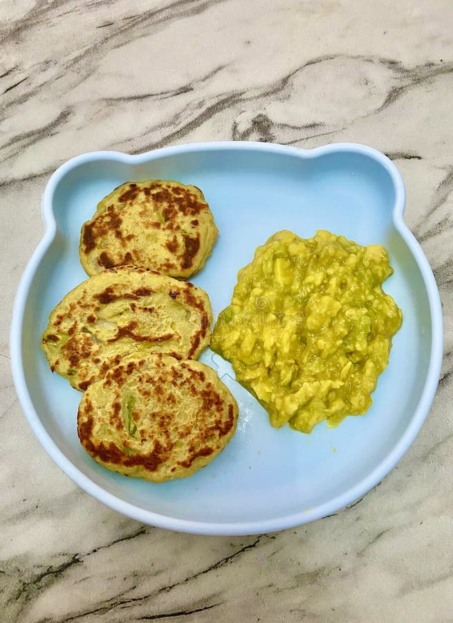 Healthy Avocado Snack for Babies - Complementary Feeding Idea Stock ...