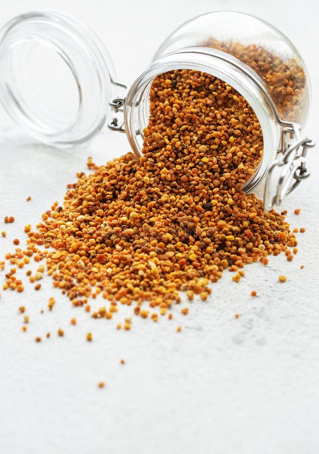 Healthy bee pollen grains stock photo. Image of eating - 321000310