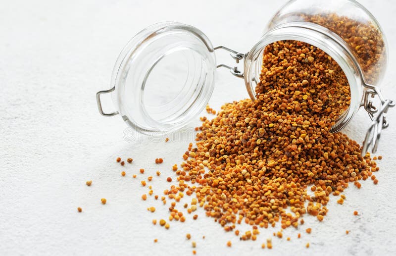 Healthy bee pollen grains stock photo. Image of brown - 323864944