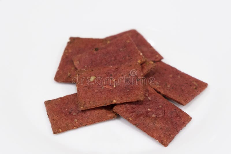 Healthy Beetroot Crackers in White Bowl. Cookies from Beets on White ...