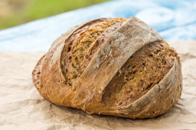 Healthy Black Bread on the Wrinkled Brown Paper Stock Image - Image of ...