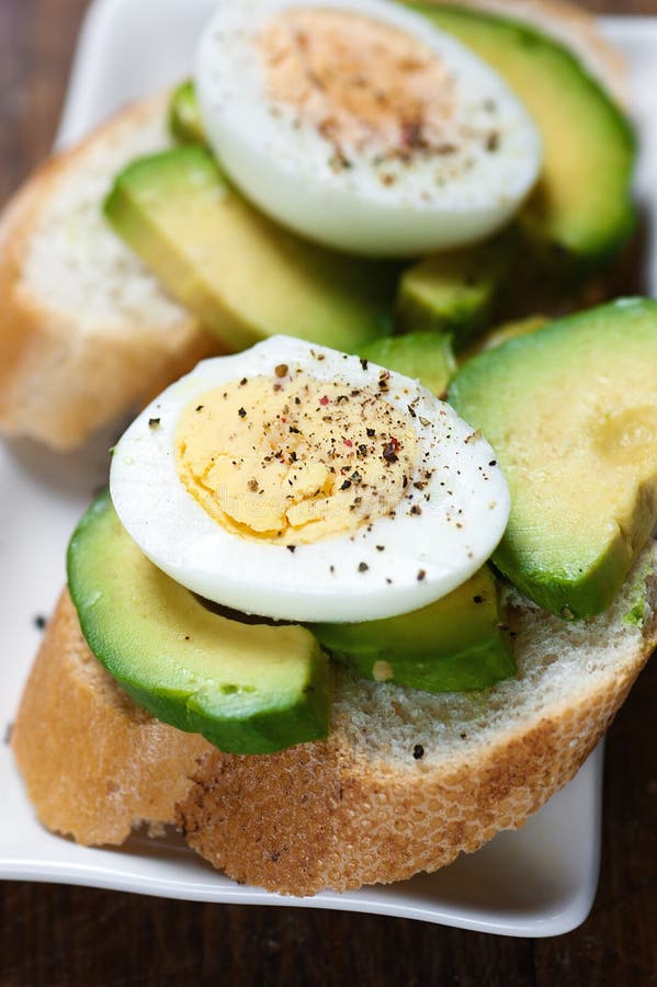 Healthy Breakfast. Sandwich with Avocado and Boiled Eggs Stock Photo ...