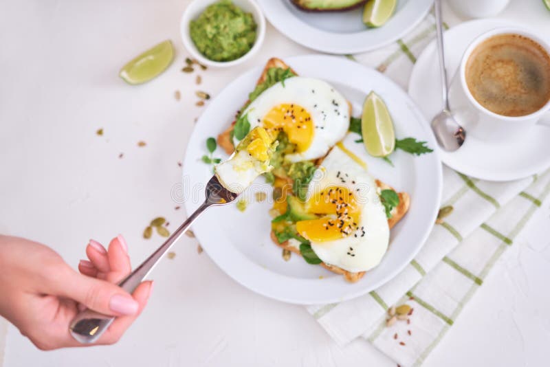 Healthy Breakfast Or Snack Sliced Avocado And Fried Egg On Toasted