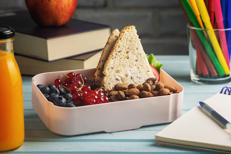 Healthy Breakfast for the Student. Lunch Box with Nuts, Berries and a ...