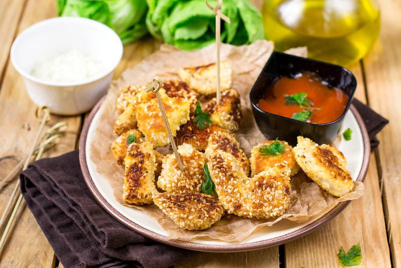 Healthy Chicken Nuggets with Sesame Seeds Stock Photo - Image of dish ...