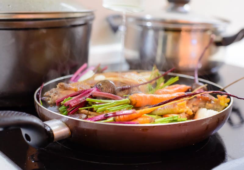 Simmering Meat Broth in Stockpot on Ceramic Cooker Stock Photo - Image ...