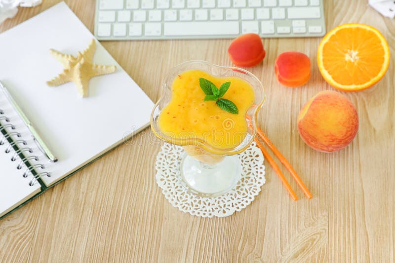 Healthy Drink Fruit Smoothie of Peach, Apricot, Orange in the Workplace ...
