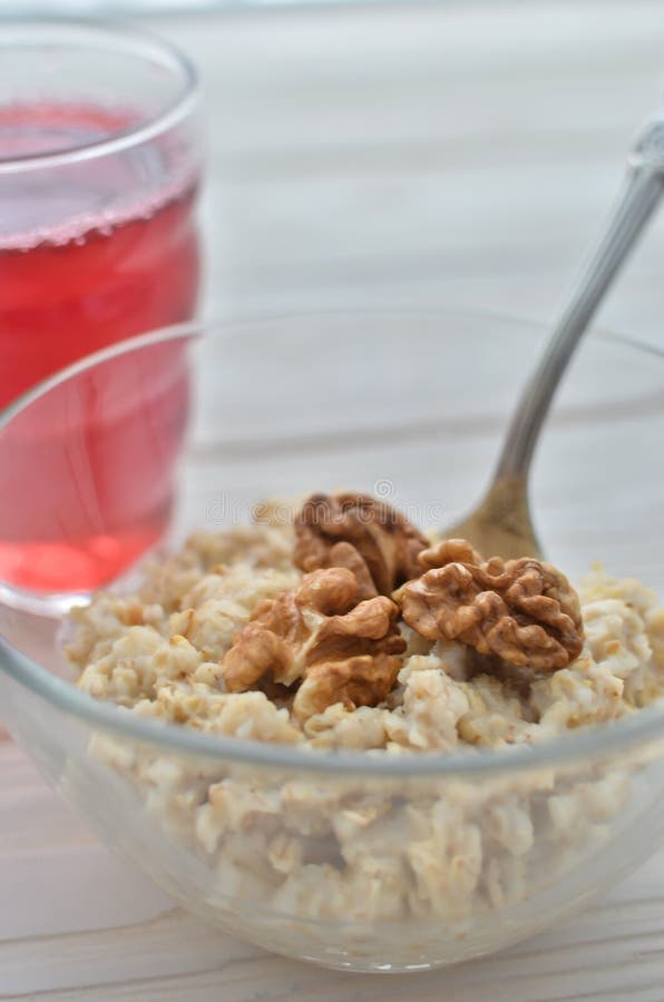 Healthy Eating Right. Oatmeal with Walnuts Stock Image - Image of ...