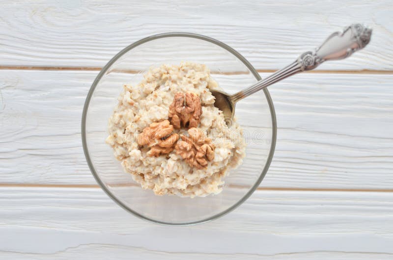 Healthy Eating Right. Oatmeal with Walnuts Stock Photo - Image of ...