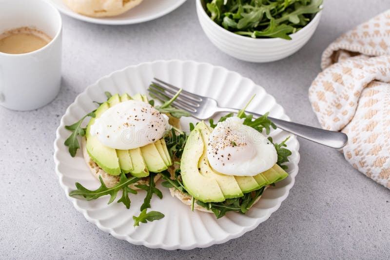Healthy Egg Benedict with Avocado and Arugula Stock Image - Image of ...