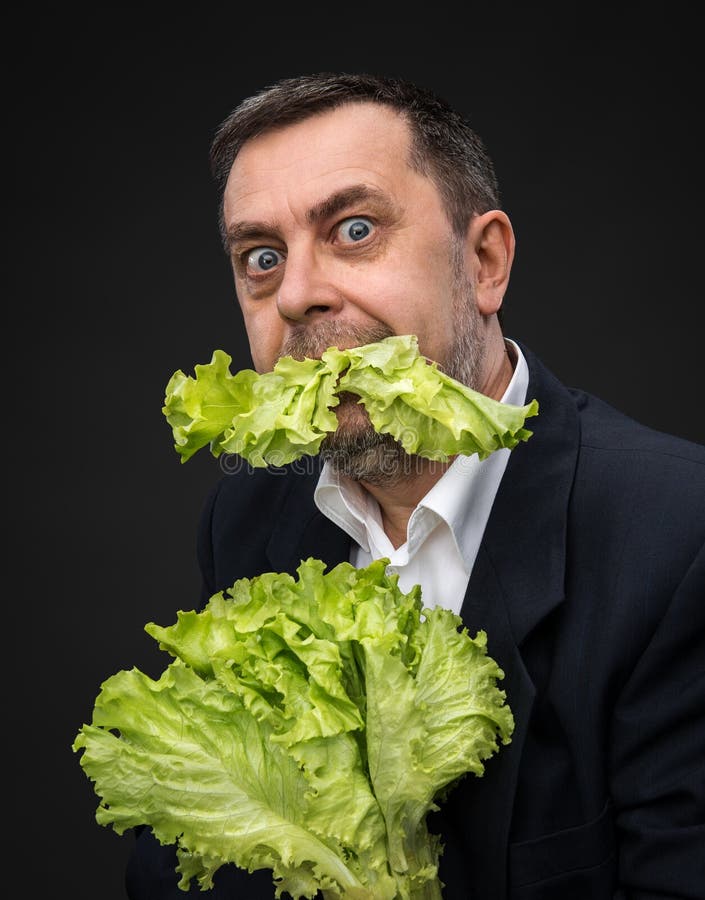2,177 Man Holding Eating Lettuce Photos - Free & Royalty-Free Stock ...
