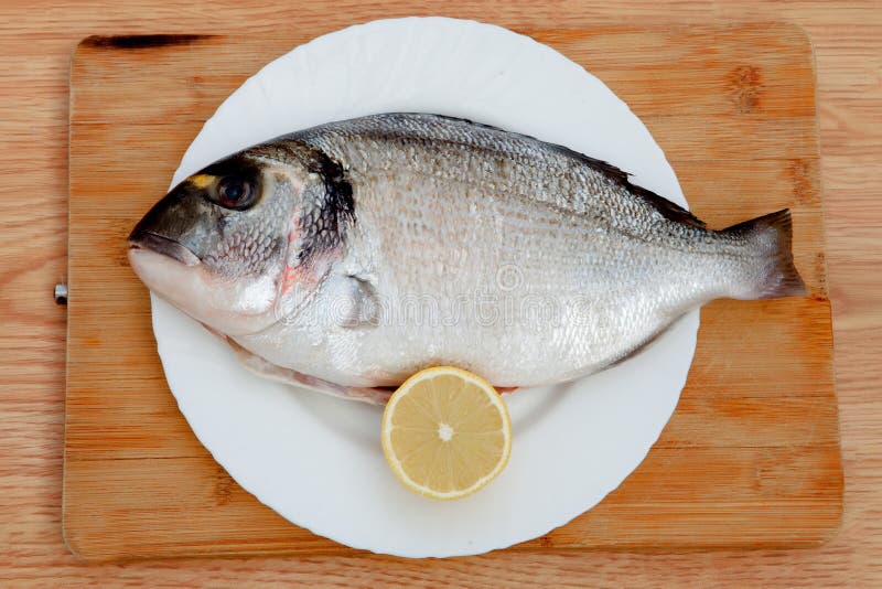 Healthy Fresh Fish on Wooden Board Stock Image - Image of silver, fresh ...