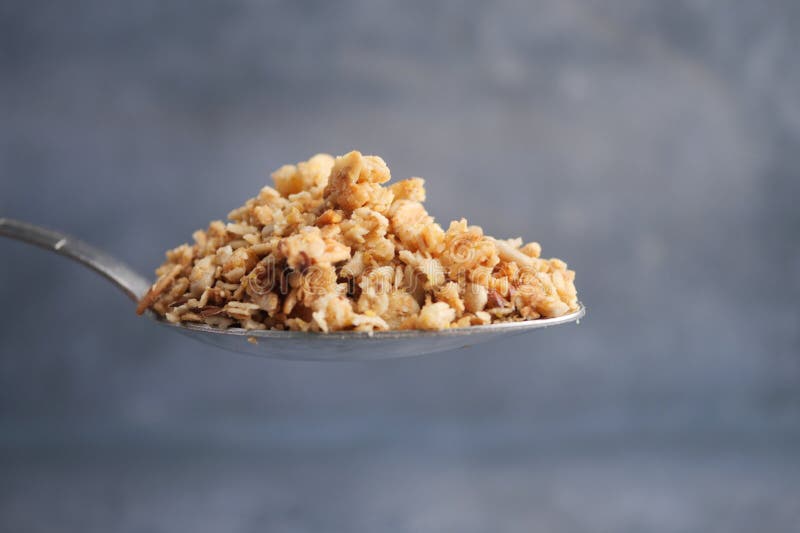 Healthy Granola Served on a Silver Spoon for a Nutritious Breakfast ...