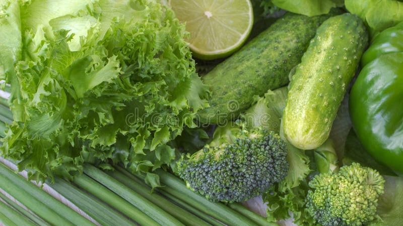 Healthy Green Vegetables: Broccoli, Lettuce, Onions and Lime Stock ...