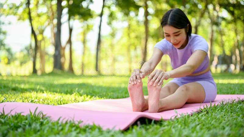 Healthy Asian Woman In Sportswear Stretching Her Legs And Arms On Yoga Mat Stock Image Image 5081