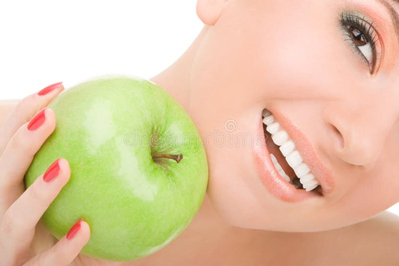 Teeth bite an apple stock photo. Image of fruit, manicure - 110232558