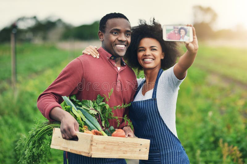This is a Healthy One. Full Length Shot of a Young Farm Couple Working ...