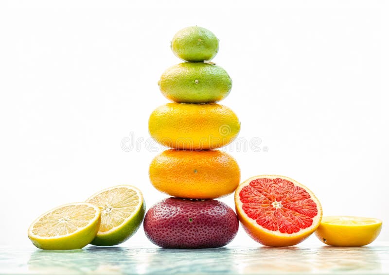 Healthy Living Concept Fruit Pyramid with Lemons, Lines, Grapefruits ...