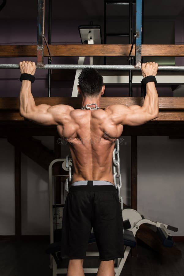Healthy Man Doing Exercise for Back with Chain Stock Image - Image of ...