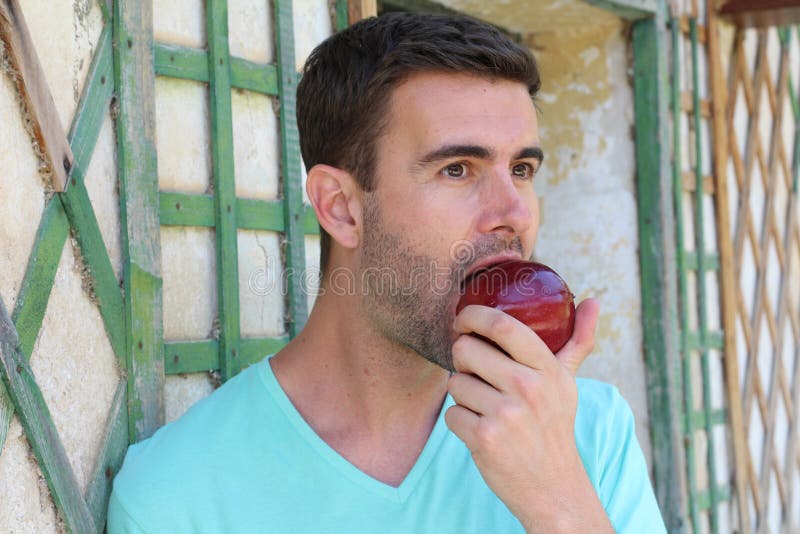 Man is biting apple stock image. Image of diet, clear - 19094207