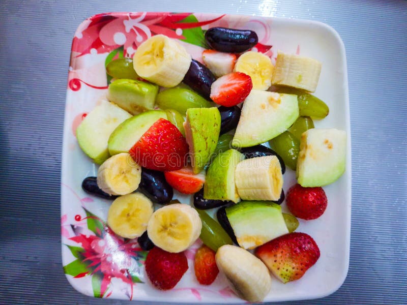 Healthy Mix Fruit Salad at Colorful Plat from Top Angle Stock Photo ...