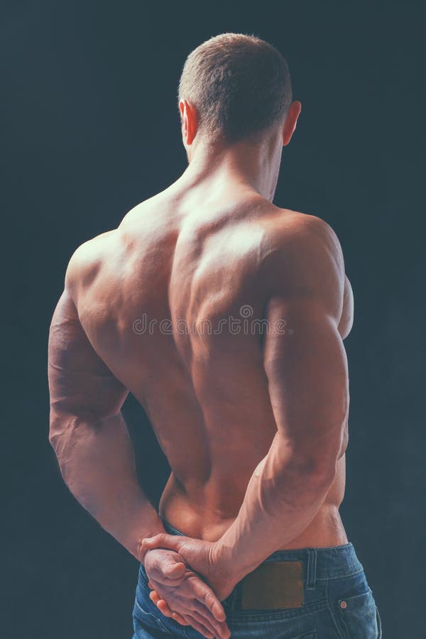 Man with Muscular Back in Dim Light, Fitness and Strength Concept Stock ...