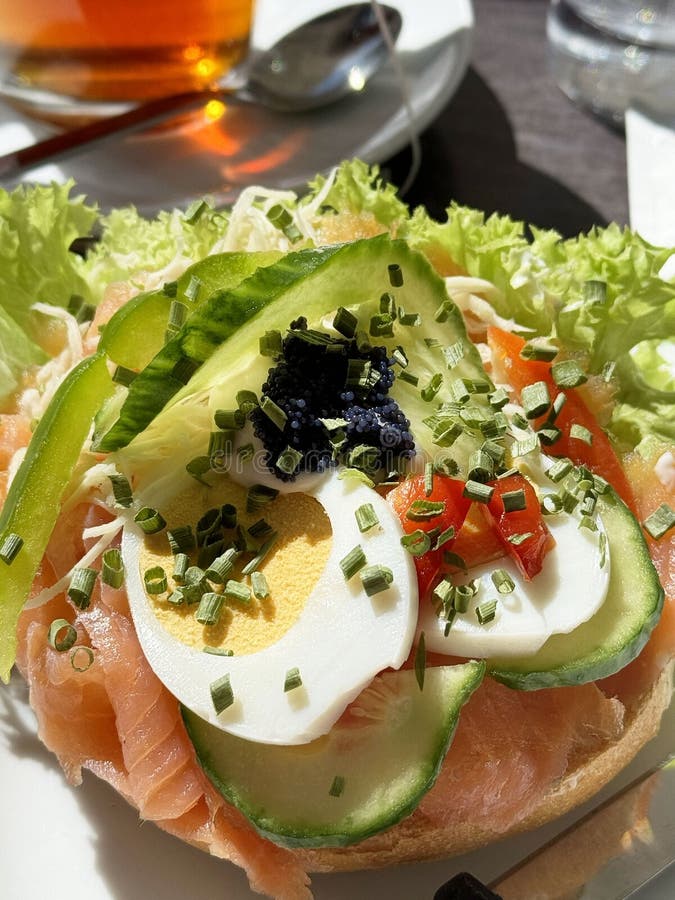 Healthy Open-faced Sandwich with Salmon, Egg, and Vegetables on Lettuce ...