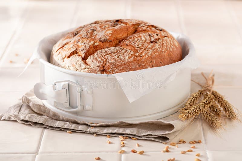 Healthy Round Loaf Bread Baking with Ears and Grain Stock Image - Image ...