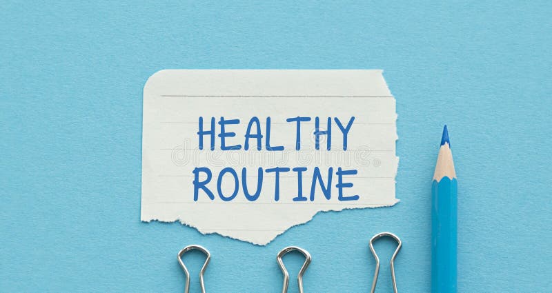 Healthy Routine Text on Torn Notepad Paper with Pencil and Clamps ...