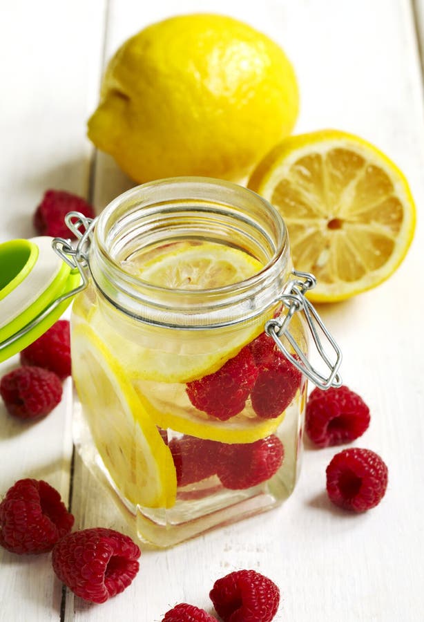 Healthy Spa Water with Raspberry and Lemon Stock Photo - Image of mason ...