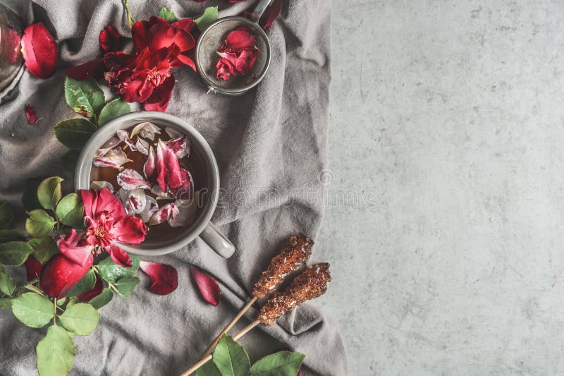Healthy Summer Roses Tea in Cup with Red Roses Petals, Top View. Stock ...