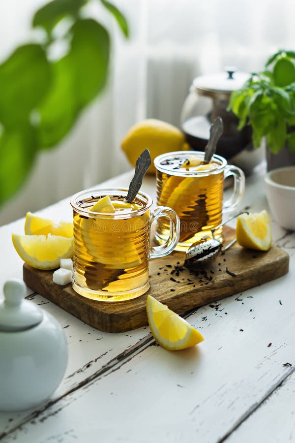 Healthy Tea with Lemon in Cups on the Table Stock Image - Image of ...