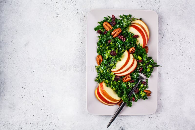 Healthy Vegan Salad with Apple, Cranberry, Kale and Pecan in a ...
