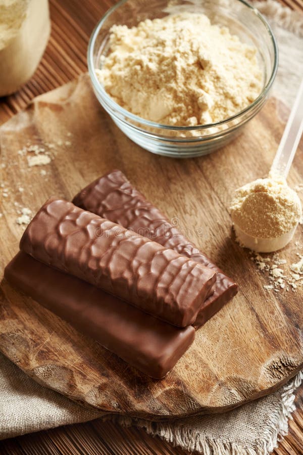 Healthy Vegetarian Protein Chocolate Bars with a Bowl of Whey Protein ...