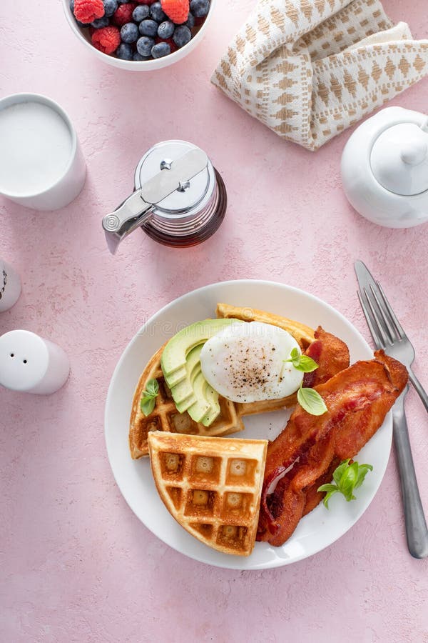 Healthy Waffle Breakfast Plate with Avocado and Poached Egg Stock Image ...