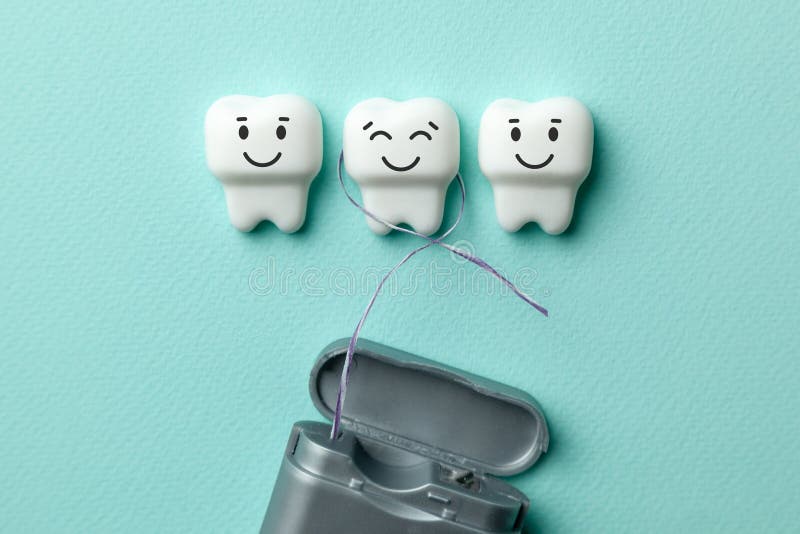 Healthy White Teeth are Smiling on Green Mint Background and Floss ...