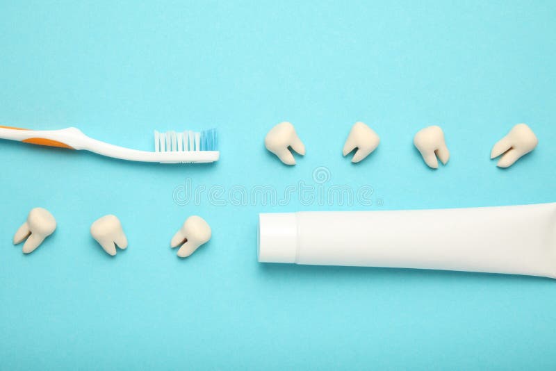 Healthy White Teeth, Toothpaste and Toothbrush on Blue Background Stock ...