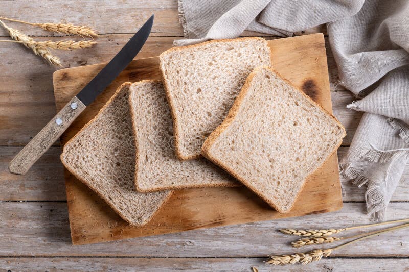 Healthy Wholemeal Bread Slices on Wooden Table Stock Photo - Image of ...