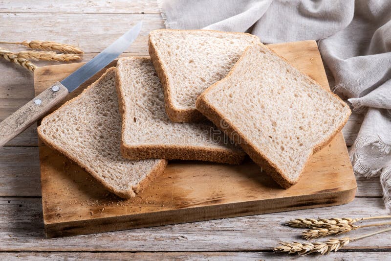 Healthy Wholemeal Bread Slices on Wooden Table Stock Image - Image of ...