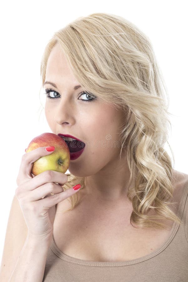Healthy Young Woman Eating a Red Apple Stock Photo - Image of woman ...