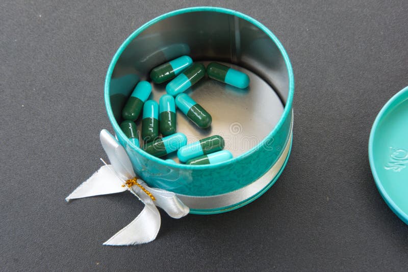 Heap of Blue Green Round Capsule Pills with Medicine Antibiotic Stock ...