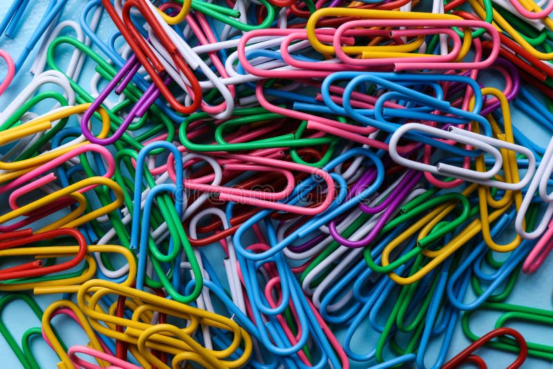Heap of Different Paper Clips As Background, Top View Stock Photo ...
