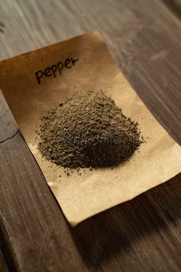 Heap of Dry Pepper Powder on Craft Paper Sheet. Aromatic Spice. Stock ...