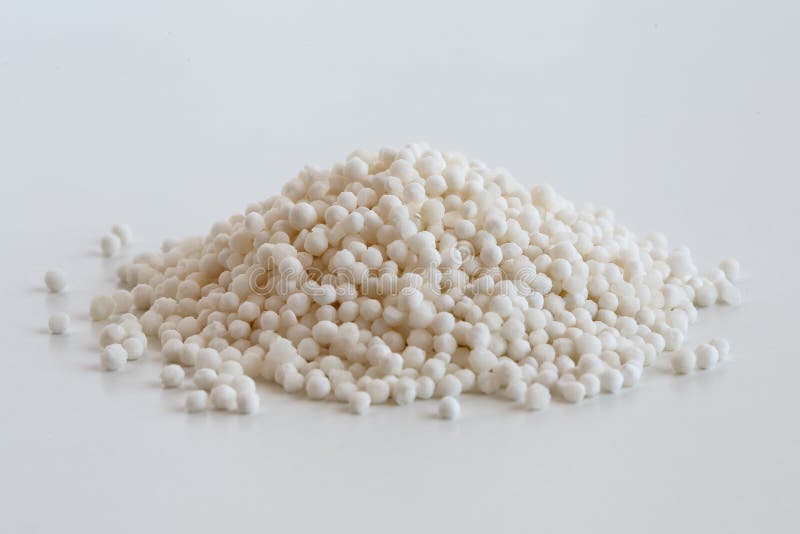 Dry Tapioca Pearls in Dark Wooden Bowl Isolated on Dark Brown Wood from ...