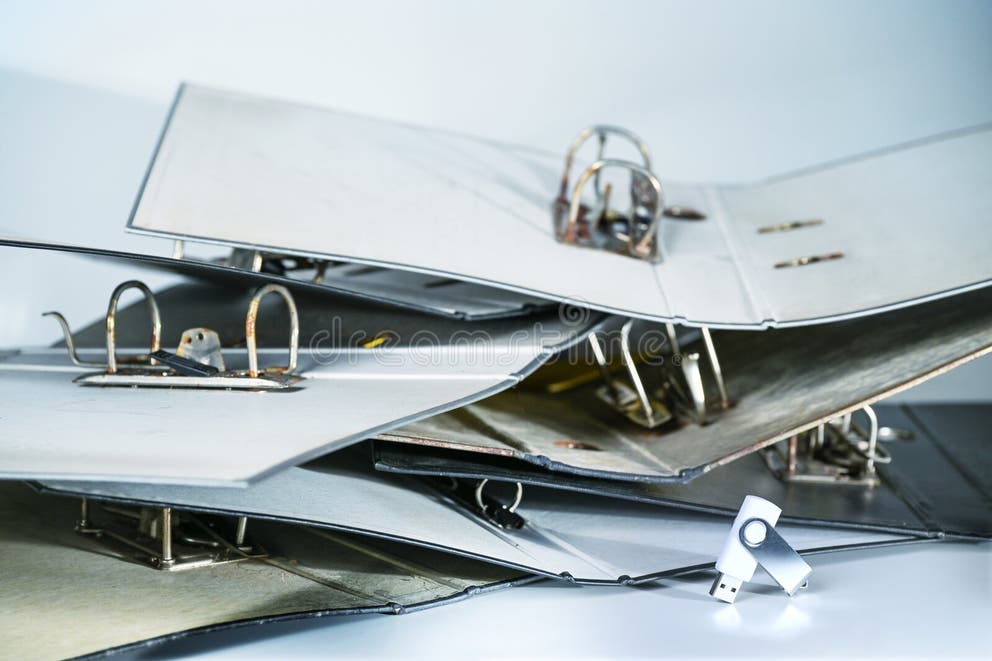 Heap of Empty Old File Folders or Ring Binders and a Small Usb-stick ...